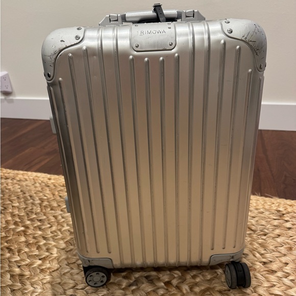 RIMOWA | Other | Rimowa Silver Rolling Suitcase | Poshmark